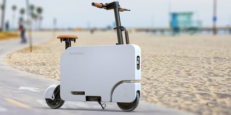 Honda's weird new suitcase-shaped scooter is a throwback to one of its ...